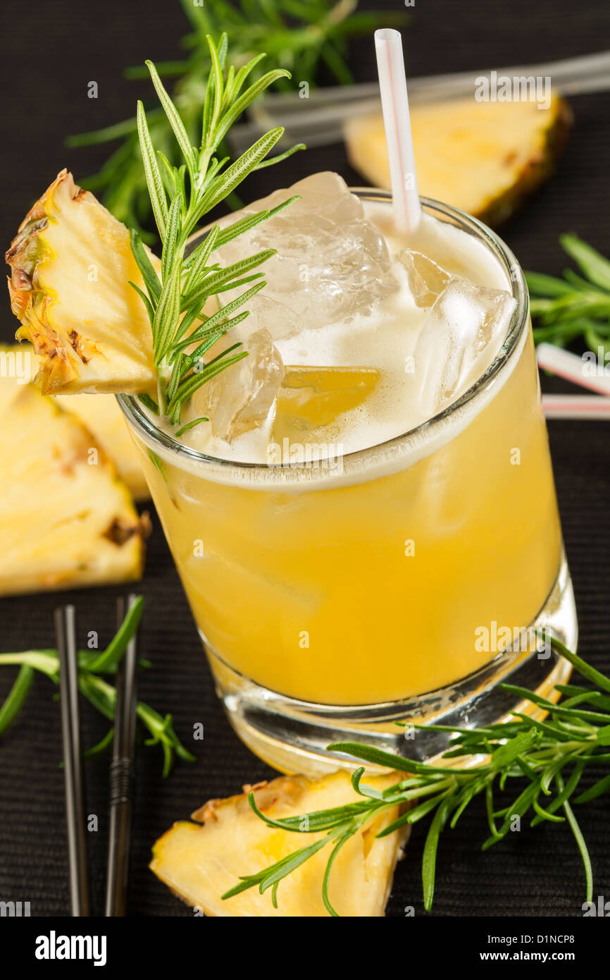 yellow drink on a black background Stock Photo - Alamy