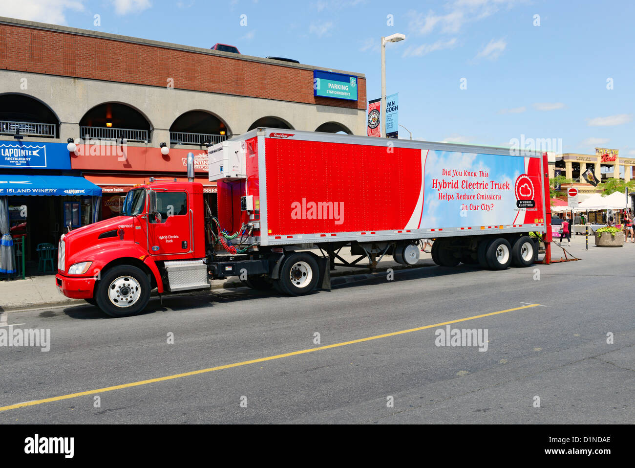 Hybrid battery powered electric large transport truck Stock Photo - Alamy