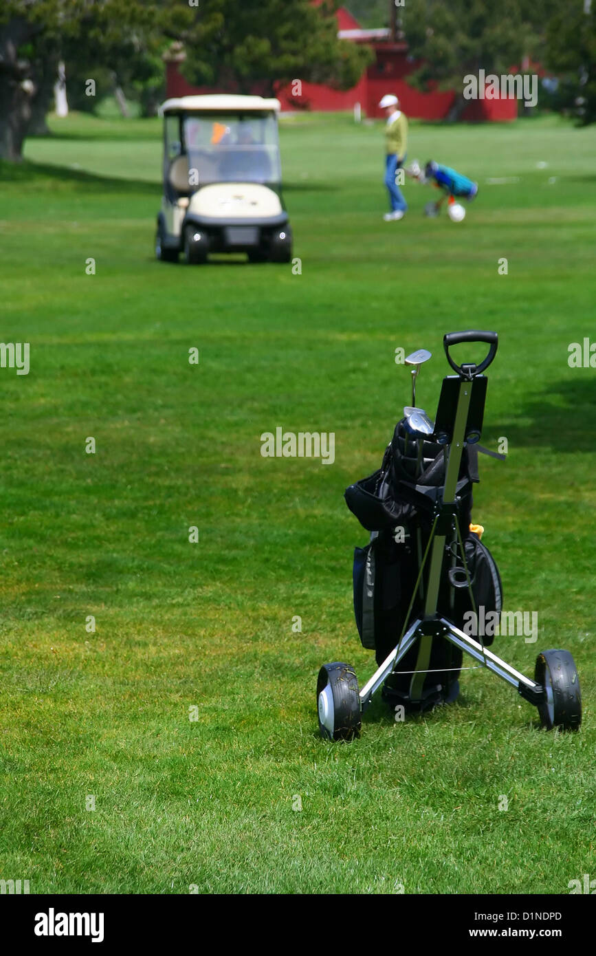 Hand cart with golf clubs on course, Agate Beach Golf Course, Newport ...