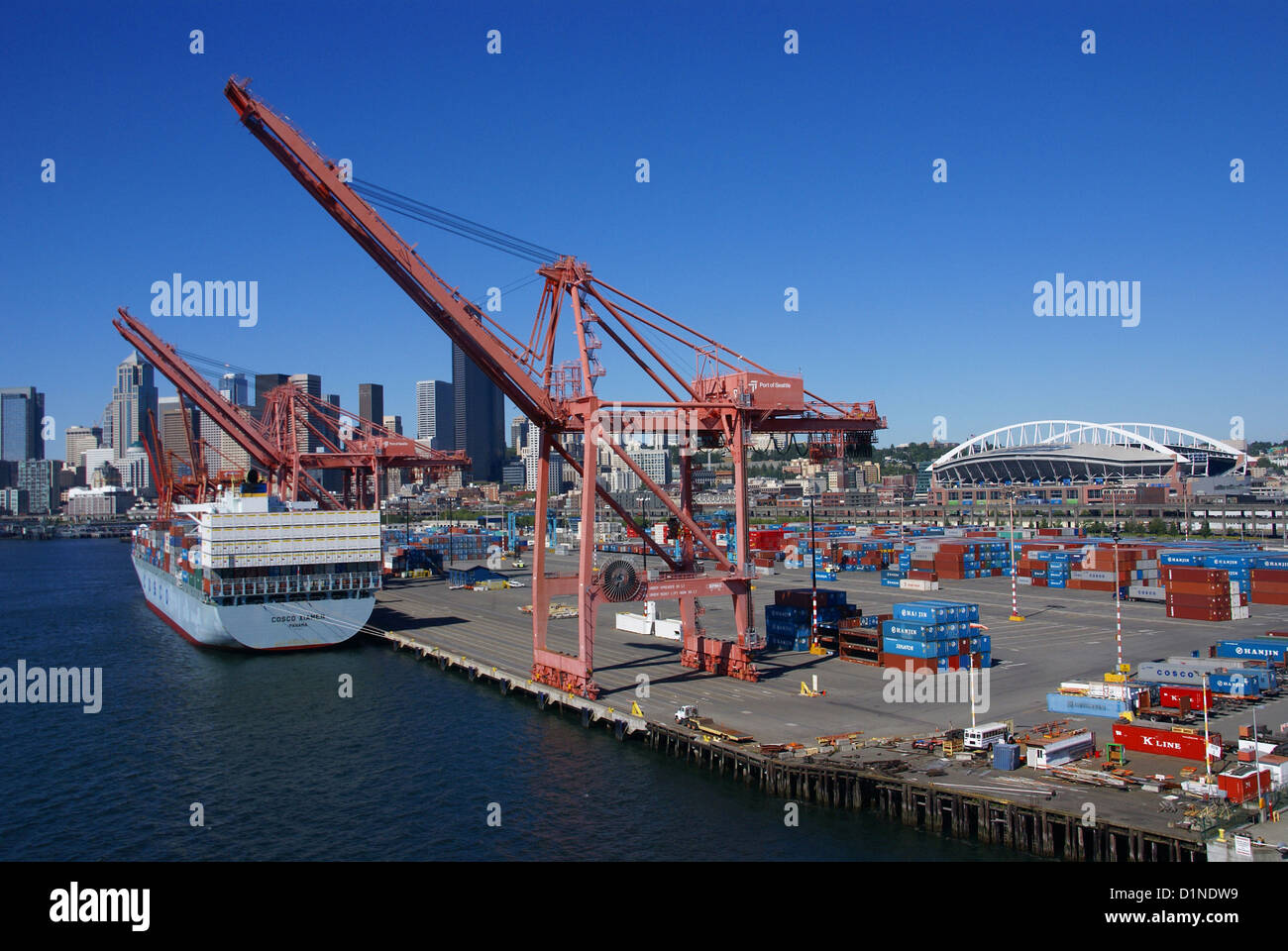 SEATTLE WASHINGTON 27 JUN 2008 - Container ship and dockyard cranes ...