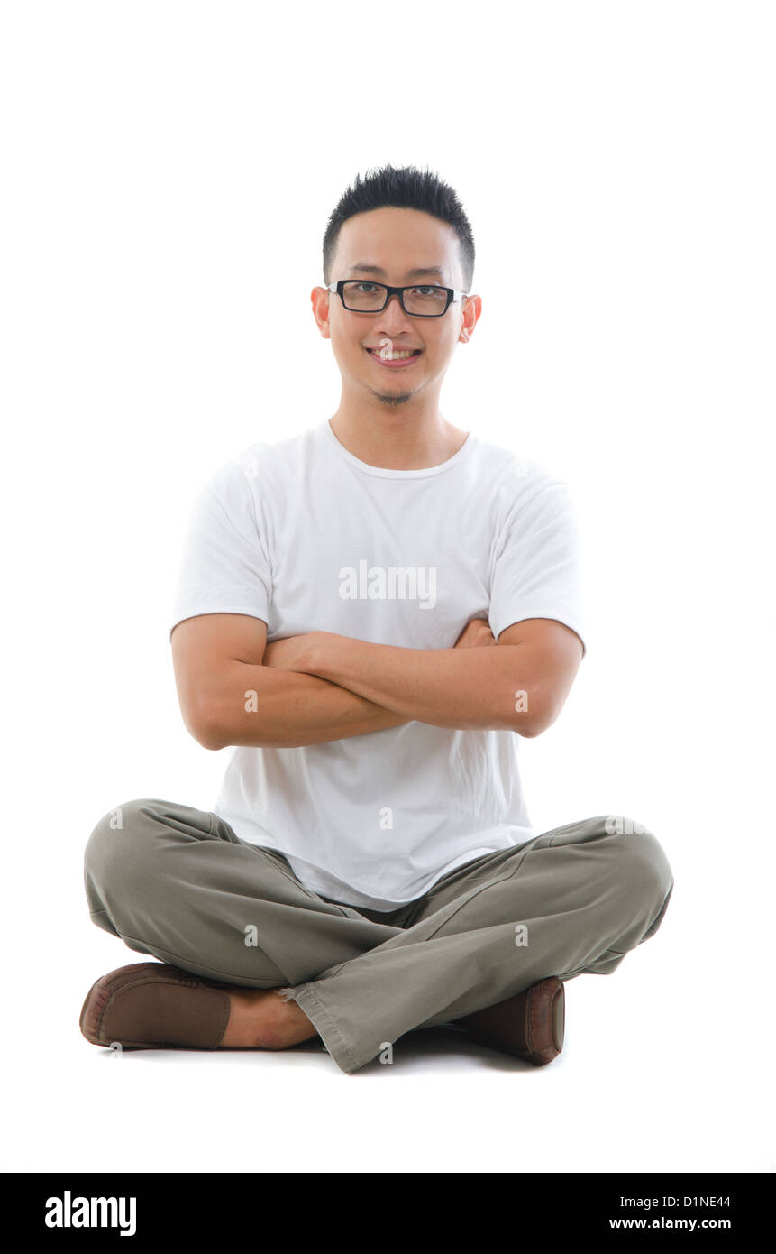 asian man sitting position Stock Photo - Alamy