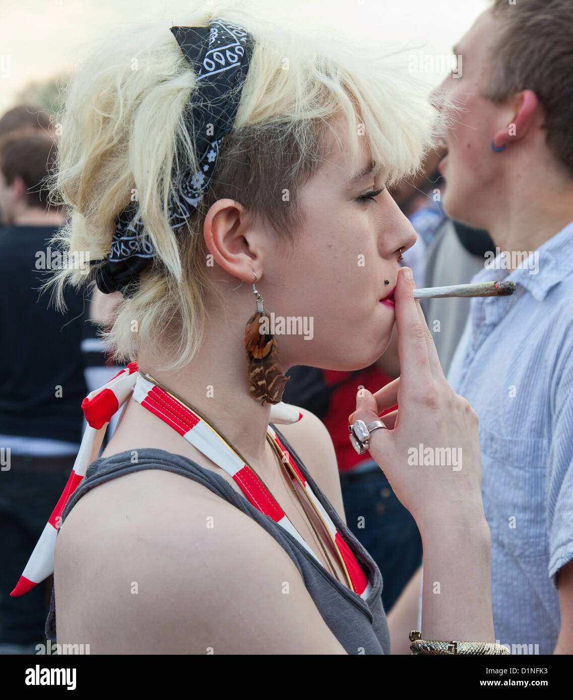 Woman smoking rolled up cigarette hi-res stock photography and images ...
