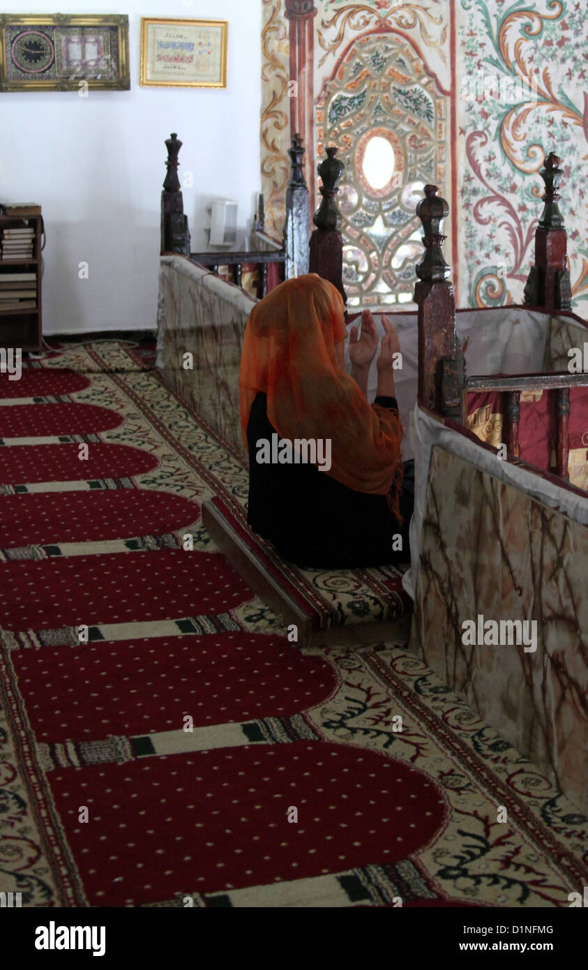 Praying Woman in the Et'hem Bey Mosque in Tirana Stock Photo - Alamy