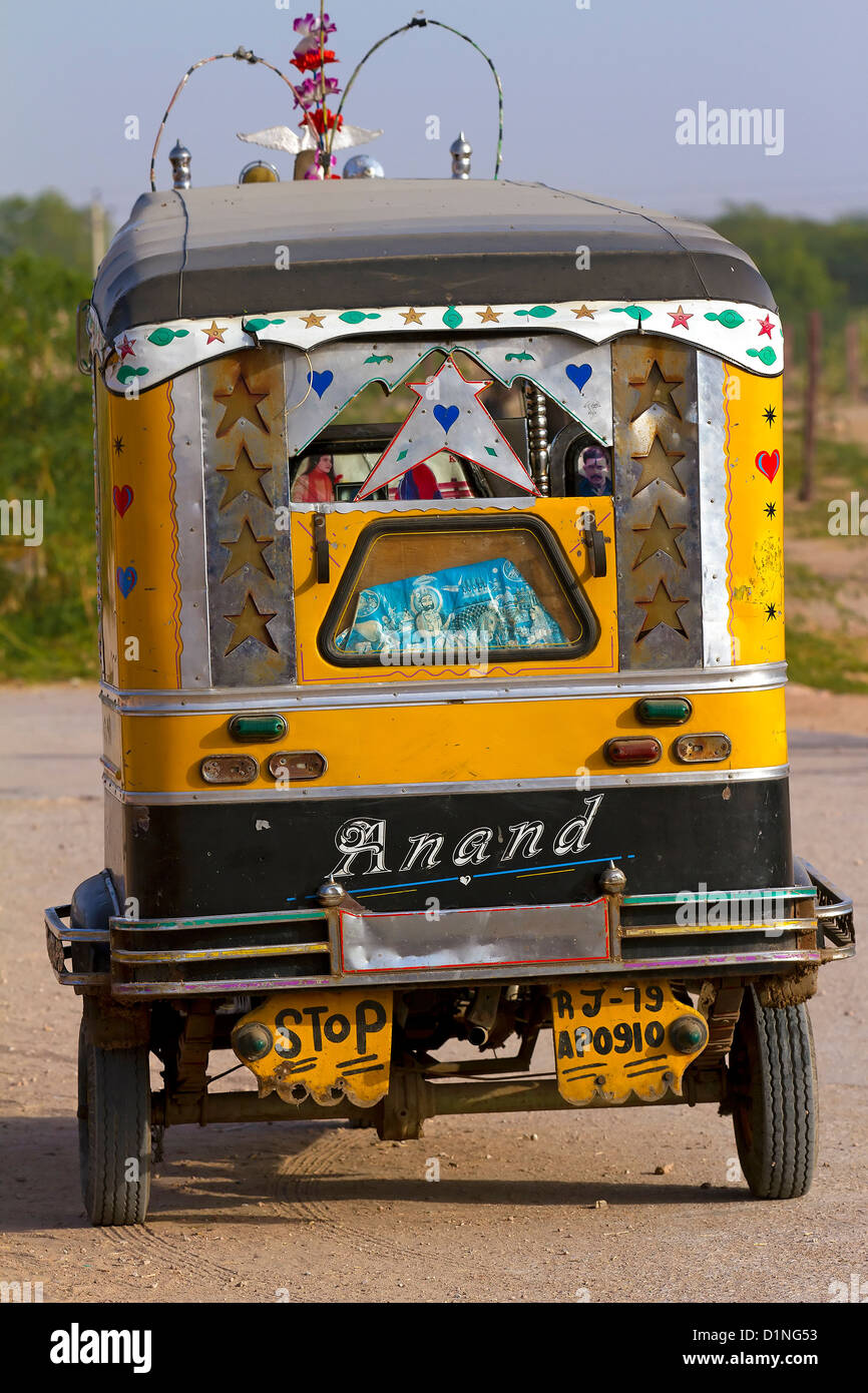 Auto rickshaw on road Stock Photo - Alamy
