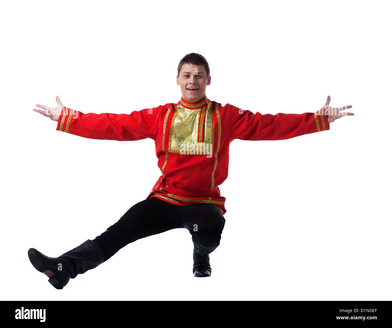 Full length portrait of man in russian costume performing dance ...