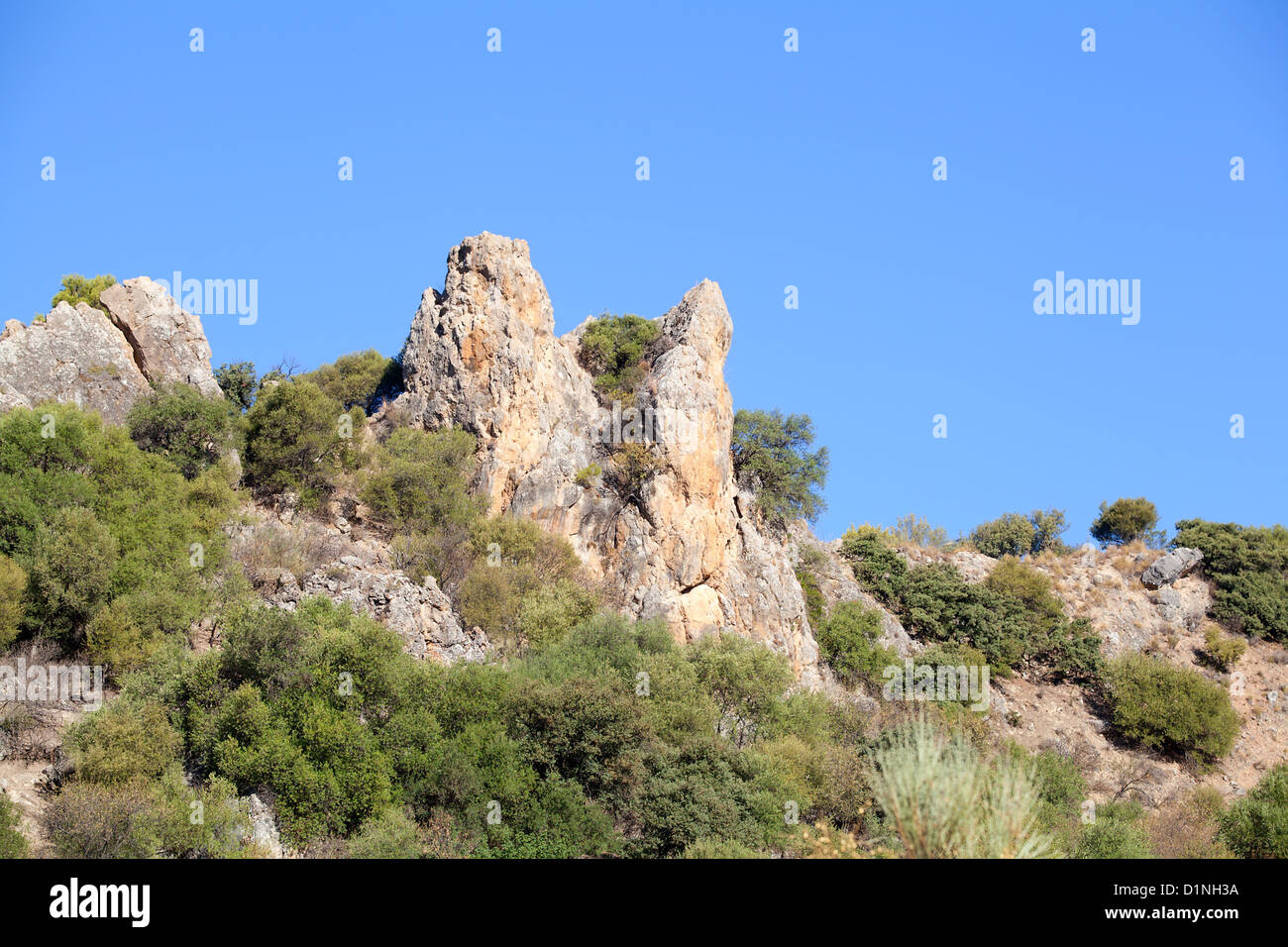 rock peaks in Spanish mountains over blue sky Stock Photo - Alamy