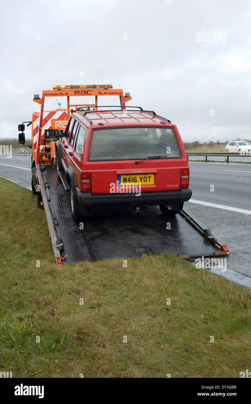 broken down car being loaded onto an rac recovery vehicle Stock Photo ...