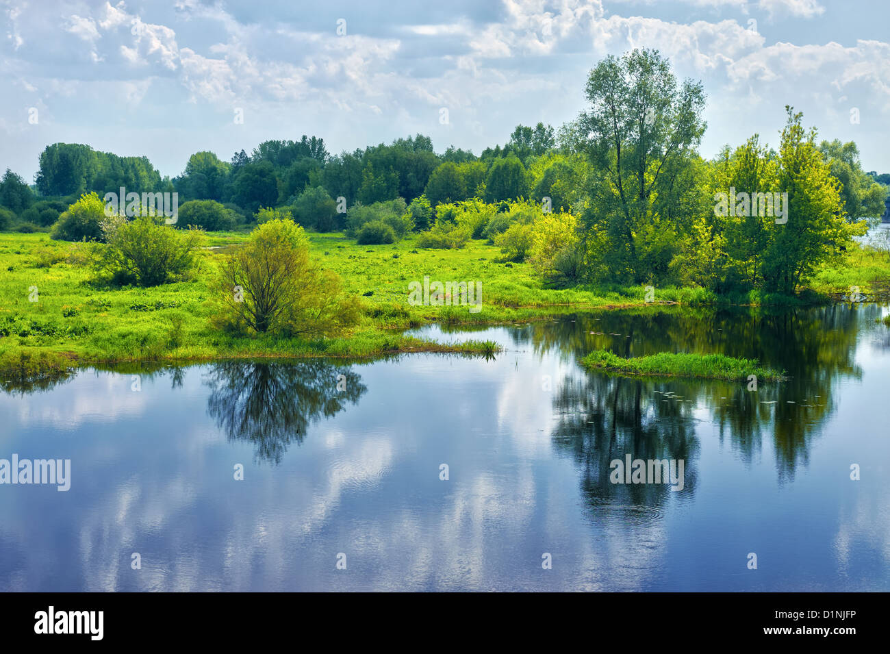 Spring landscape with river and clouds on the sky Stock Photo - Alamy