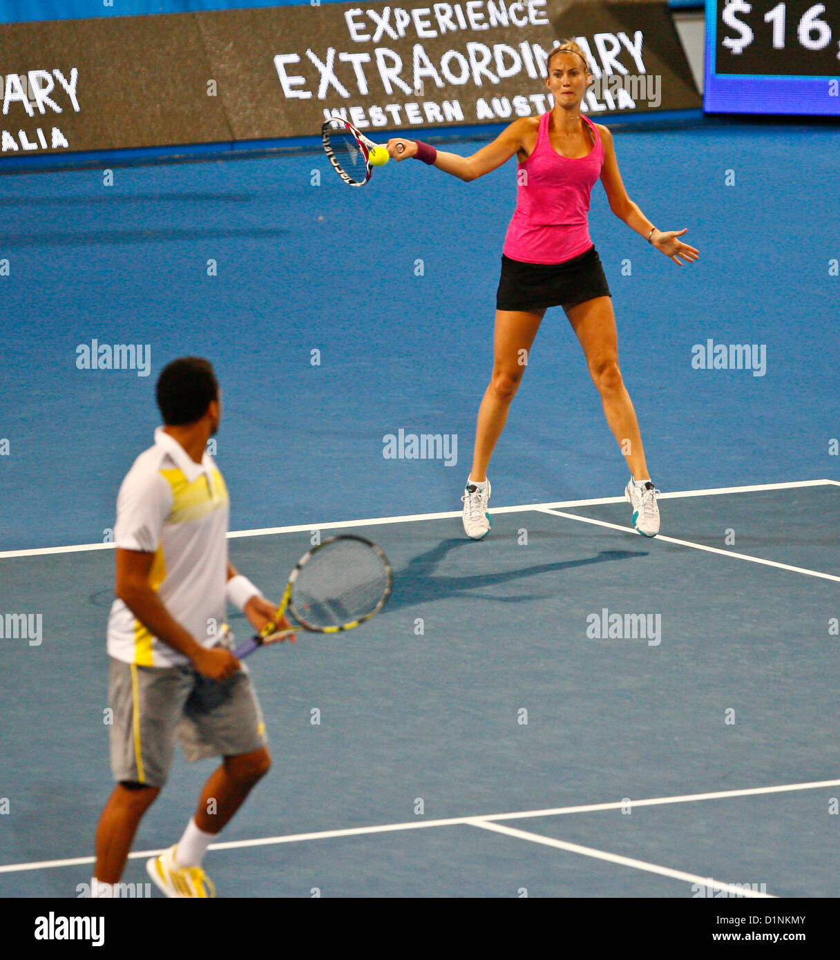 01.01.2013 Perth, Australia. Jo-Wilfred Tsonga and Mathilde Johansson (FRA) in the mixed doubles ...