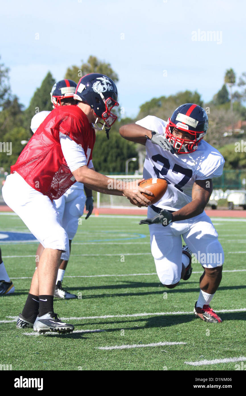 Corey Cooper, a wide receiver for the East Coast Team, performs a stiff ...