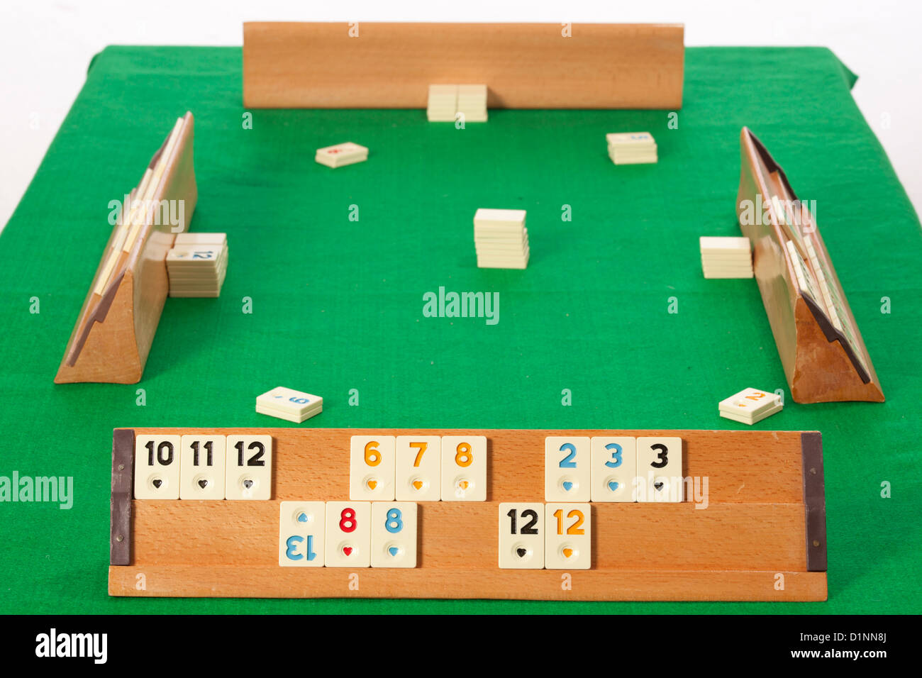 empty rummy table over green background Stock Photo - Alamy