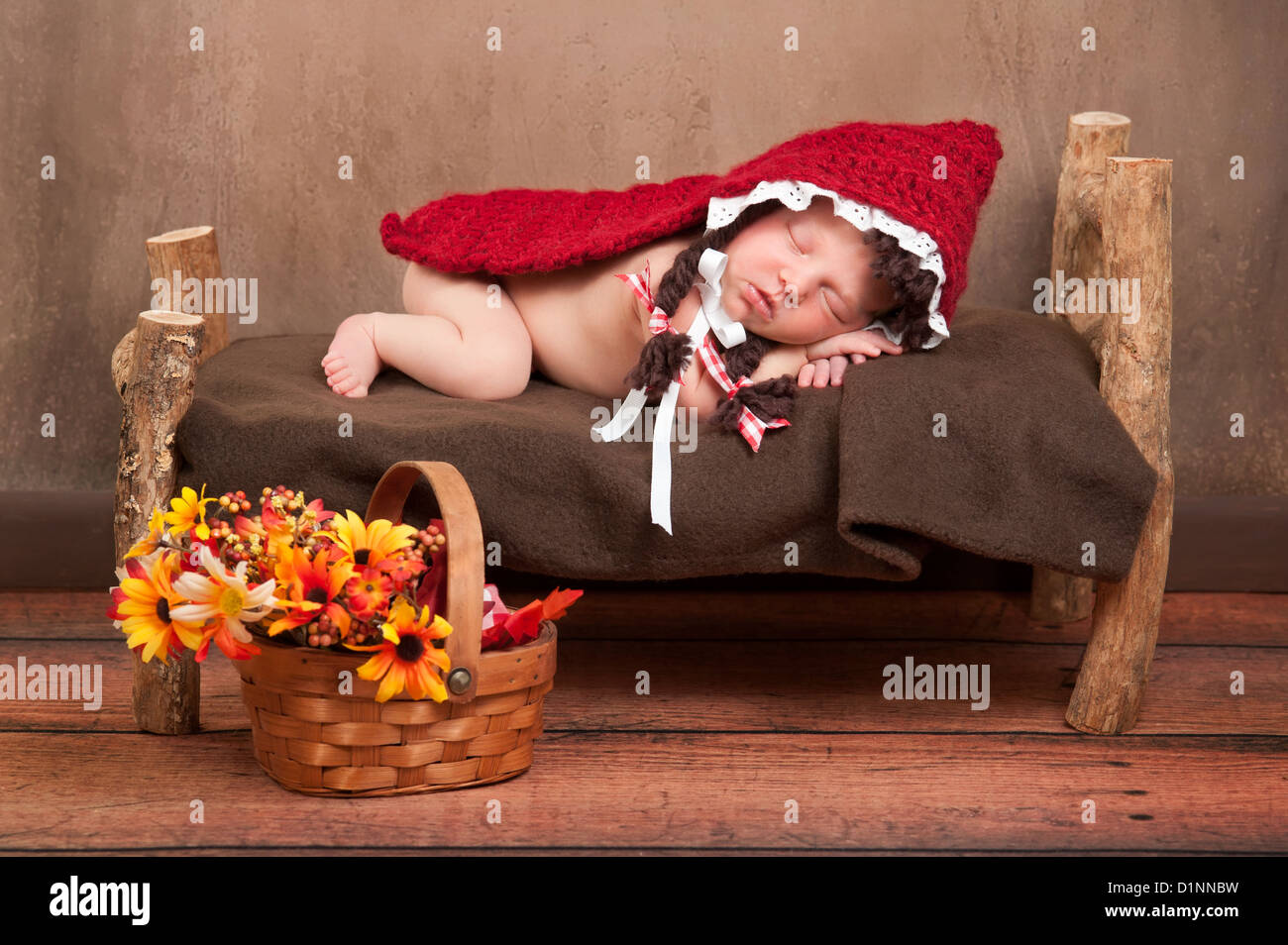 Newborn Baby Girl Wearing a Little Red Riding Hood Costume Stock Photo ...