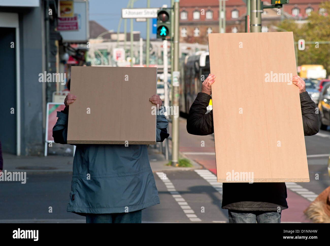 Berlin, Germany, two men wearing chipboard Stock Photo - Alamy