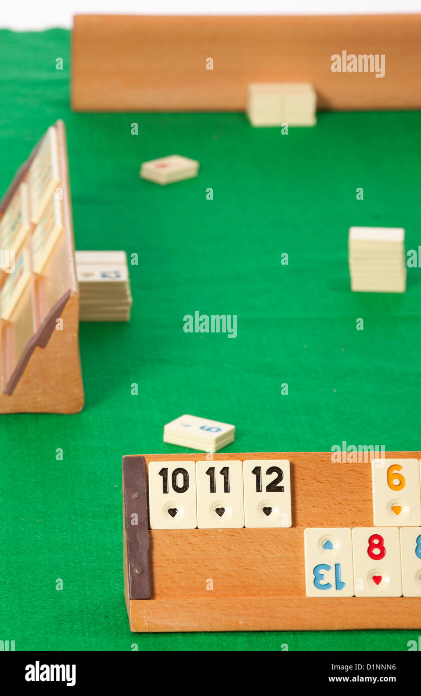 empty rummy table over green background Stock Photo - Alamy