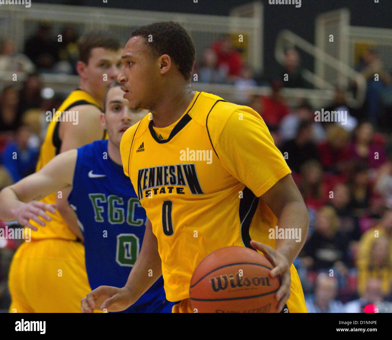 KSU's Myles Hamilton (0) hanldes the ball during Florida Gulf Coast's ...