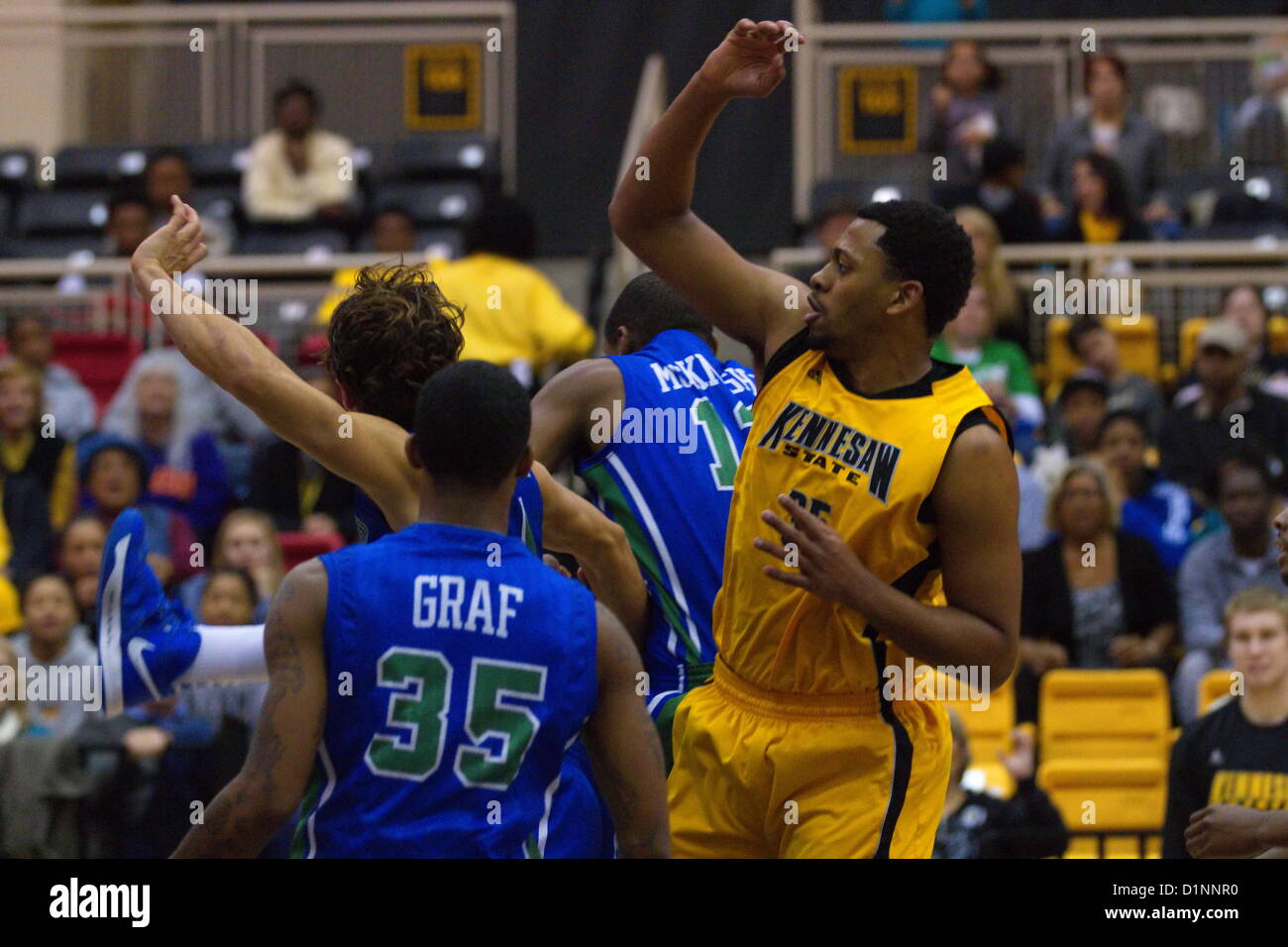 Brandon Dawson (yellow) and DuJuan Graf (35) battle during Florida Gulf ...