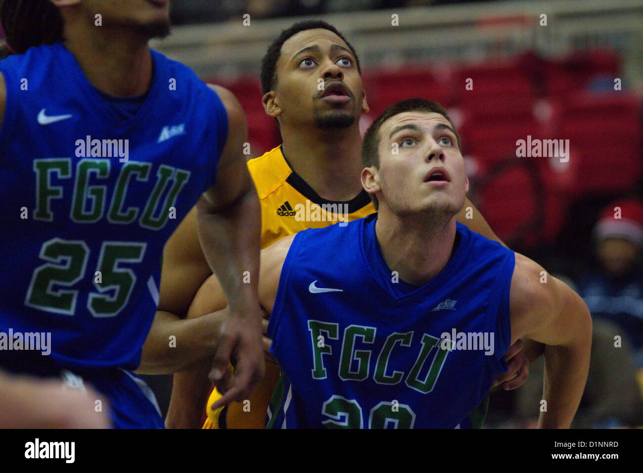 FGCU's Chase Fieler looks up at the basket waiting for a rebound during ...