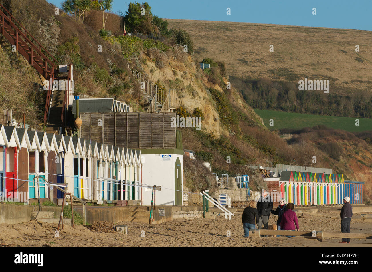 Swanage cliffs and beach huts at the northern end of Swanage bay Stock ...