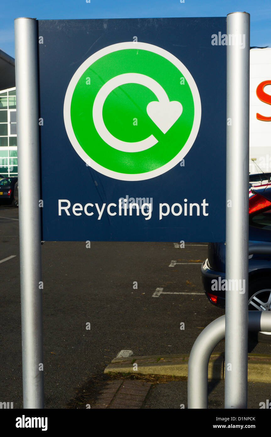 Sign for a recycling point in the car park at a supermarket Stock Photo ...