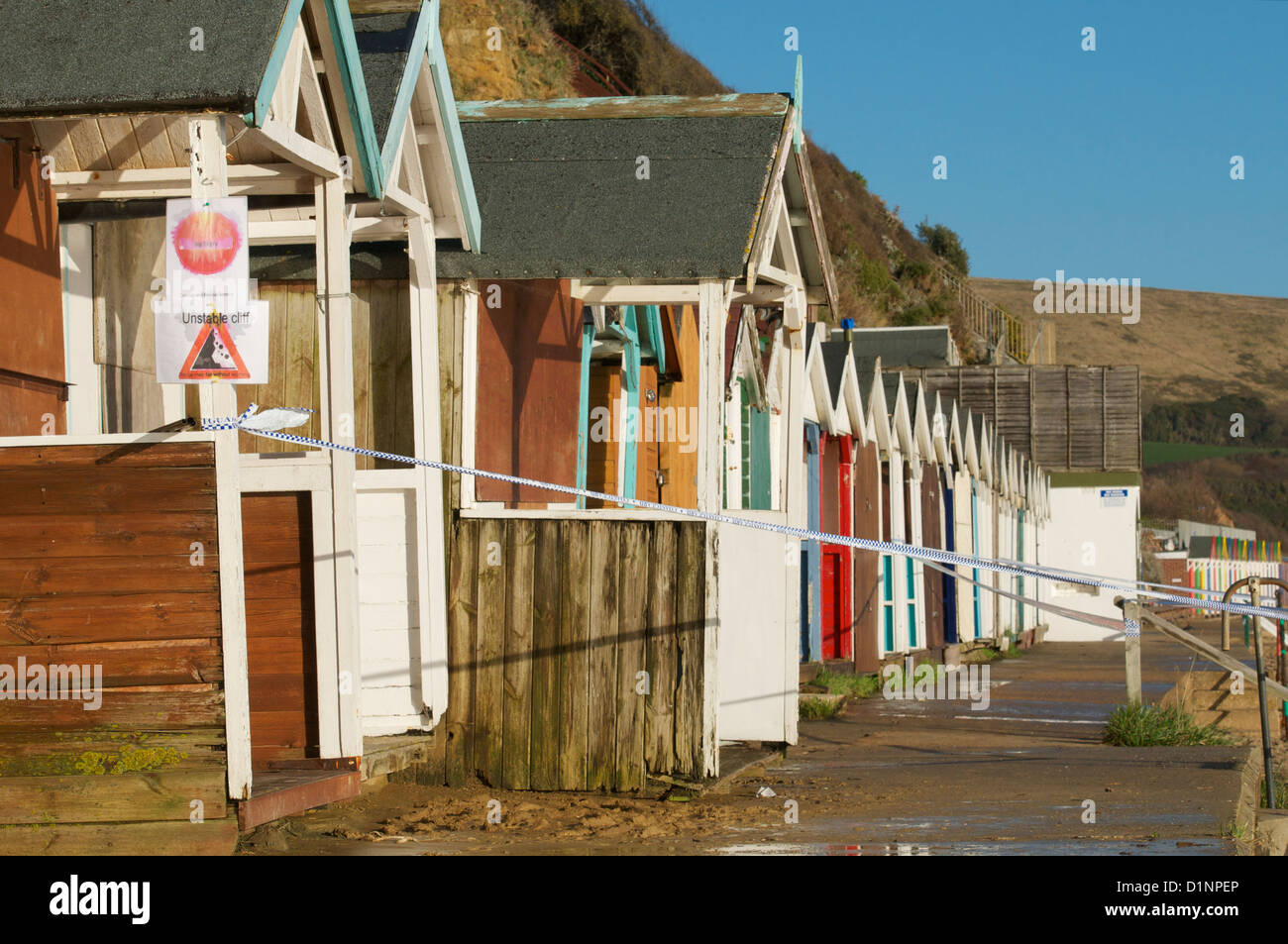 Swanage cliffs and beach huts at the northern end of Swanage bay Stock ...