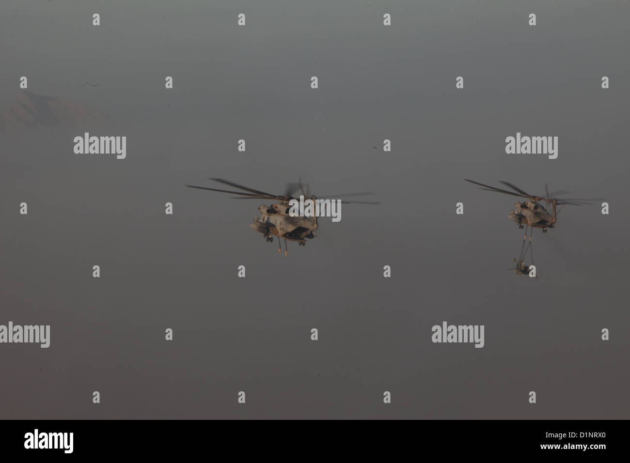 Two U.S. Marine Corps CH-53E Super Stallion helicopters from HMH-361 ...