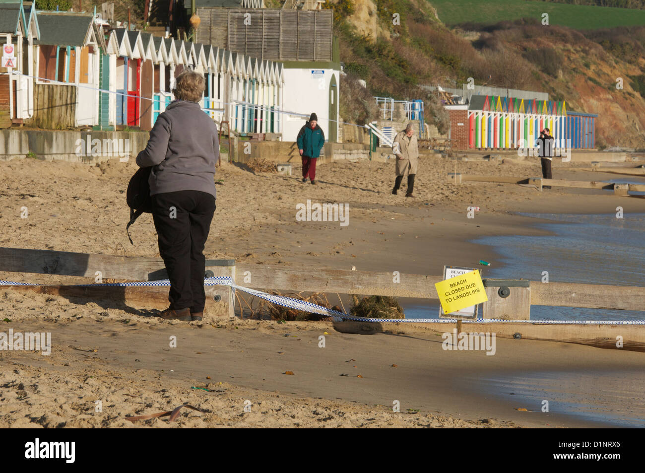 Swanage cliffs and beach huts at the northern end of Swanage bay Stock ...