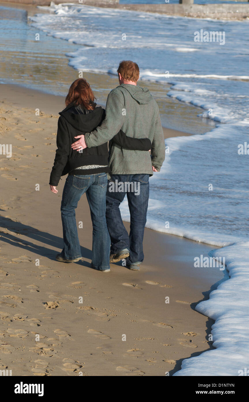 Walking with linked arms hi-res stock photography and images - Alamy