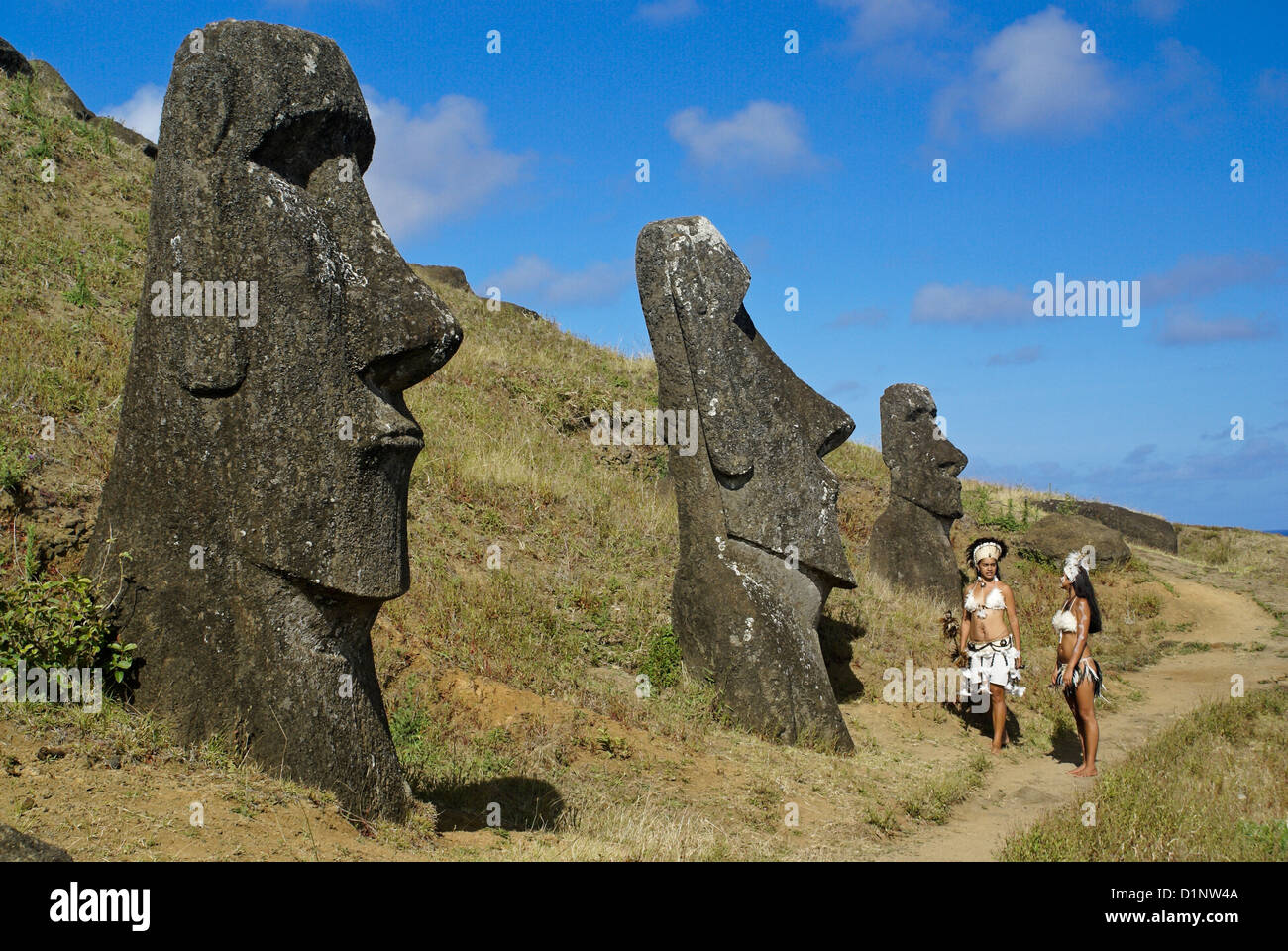 Rapanui women with moai, Rano Raraku, Easter Island, Chile Stock Photo ...