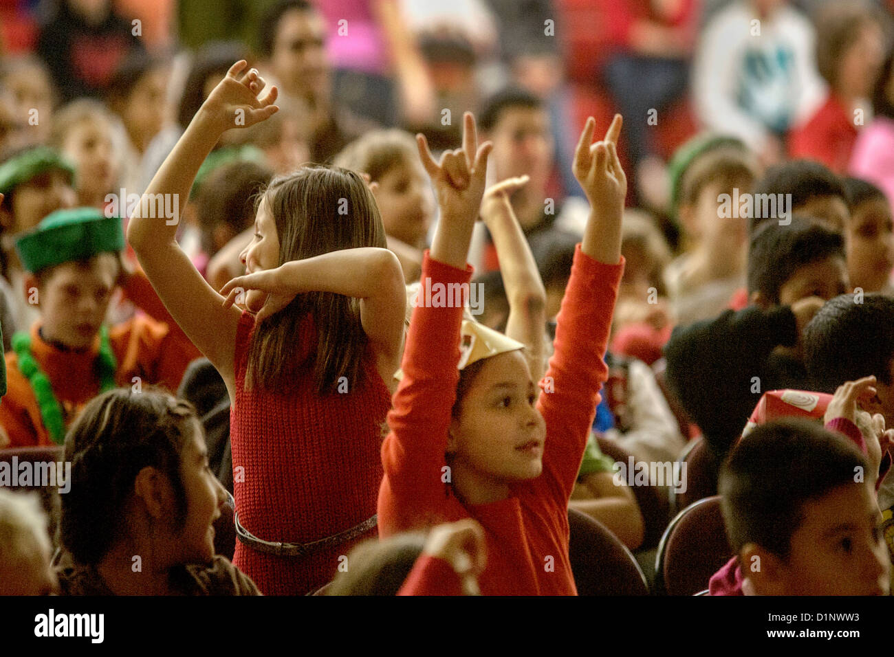 Deaf children applaud in sign language during a Christmas pageant at ...