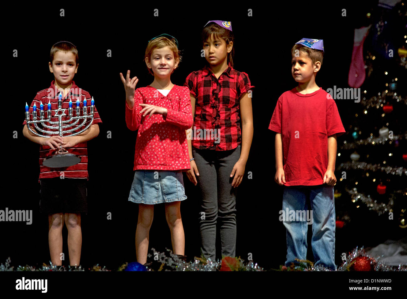 Deaf Jewish children act out a skit in sign language during a Christmas ...