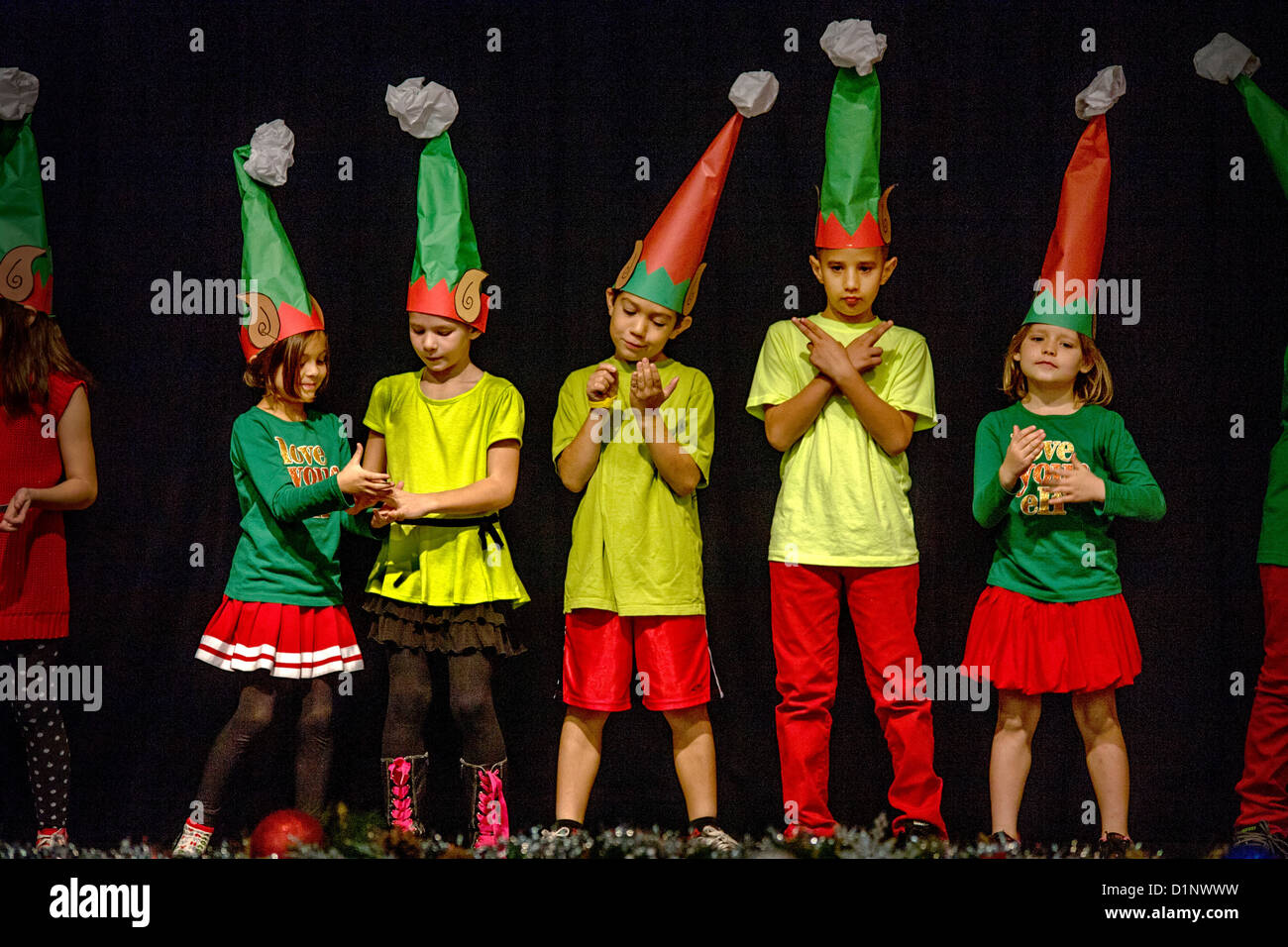 Deaf children act out a skit in sign language during a Christmas ...