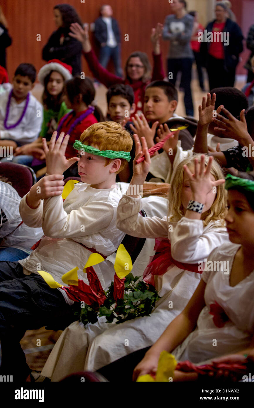 Deaf children applaud in sign language during a Christmas pageant at ...