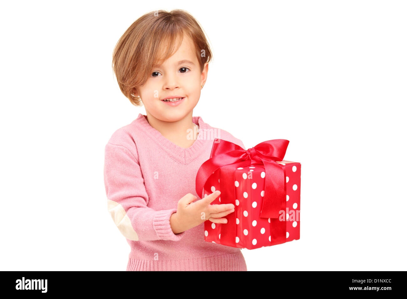 A smiling child holding a gift isolated against white background Stock ...