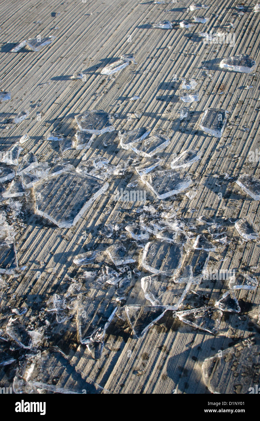 Shards Of Smashed Ice On The Ground Stock Photo - Alamy