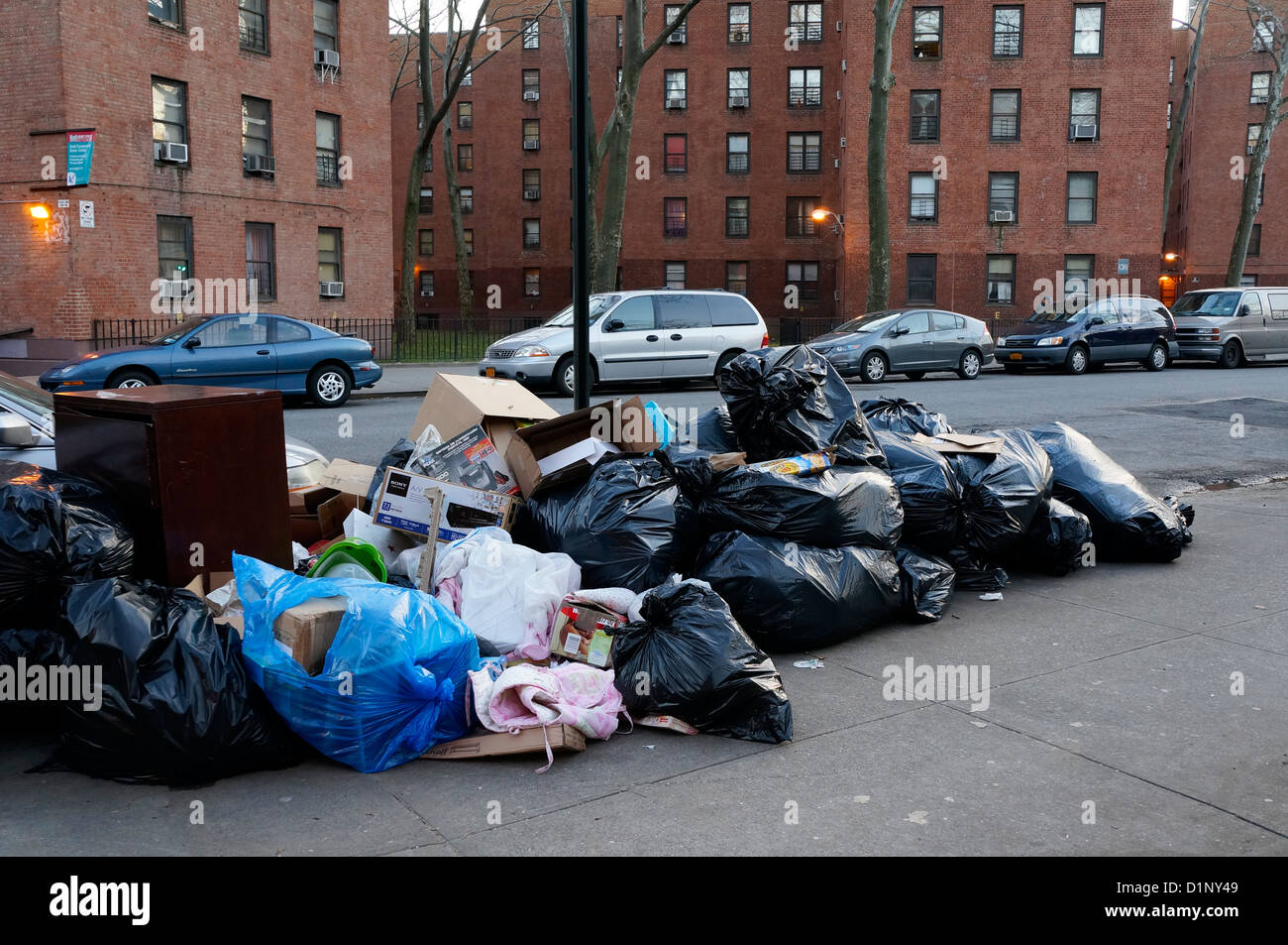 Garbage on New York City street in housing project Stock Photo - Alamy