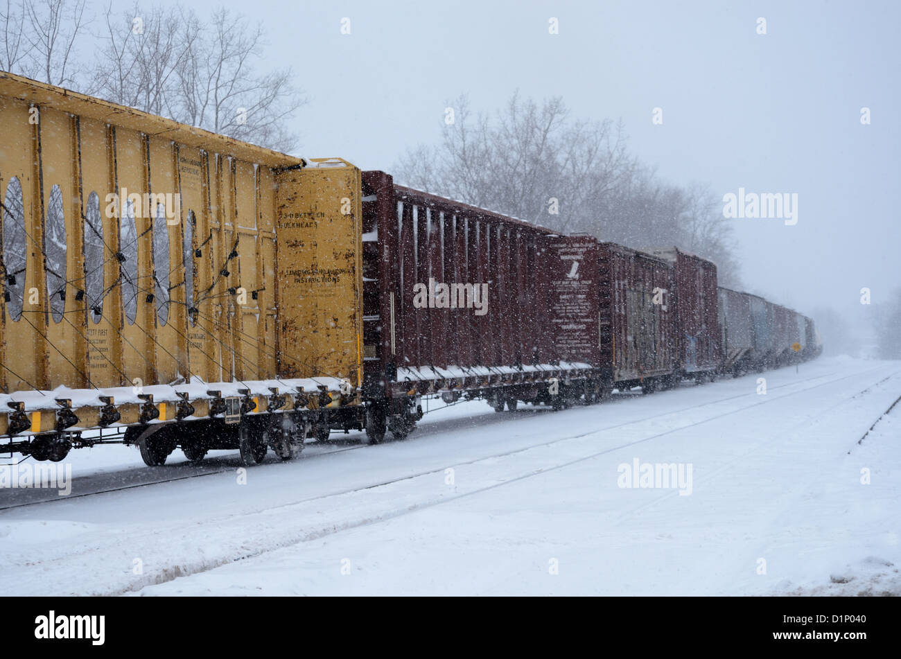 Freight train moves through snow storm in upstate New York, US Stock ...