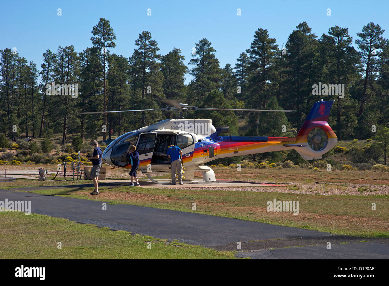 Tourists in departure area for Papillon Helicopter trip, South Rim ...
