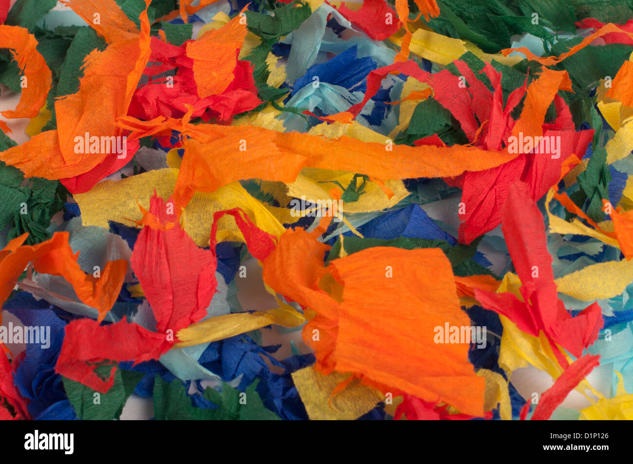 Background of many colorful pieces of torn paper Stock Photo - Alamy
