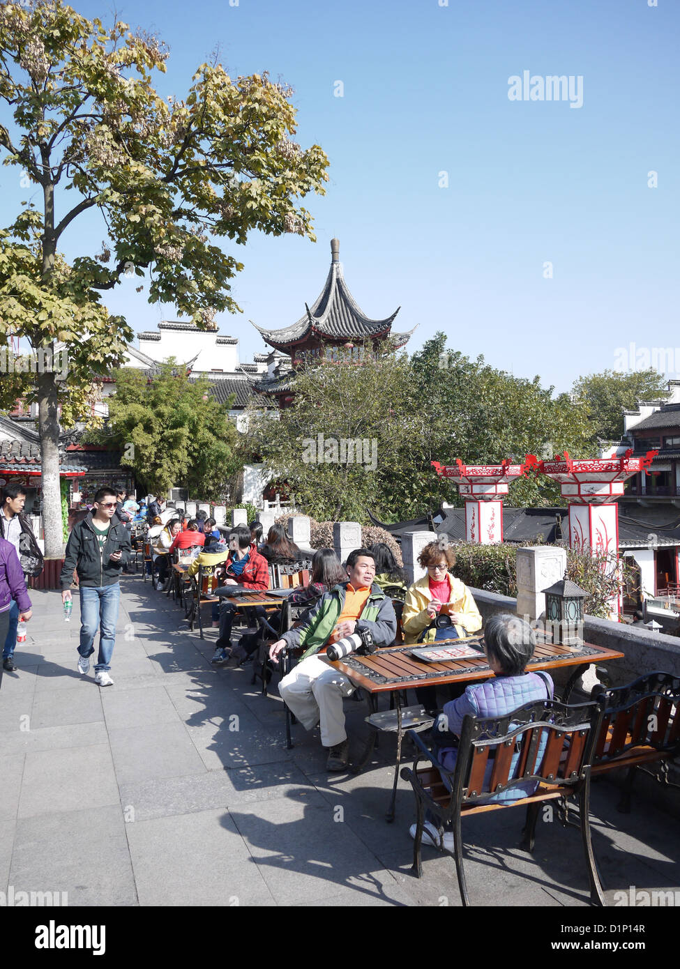 outdoor patio chinese people asian male female relaxing Stock Photo - Alamy