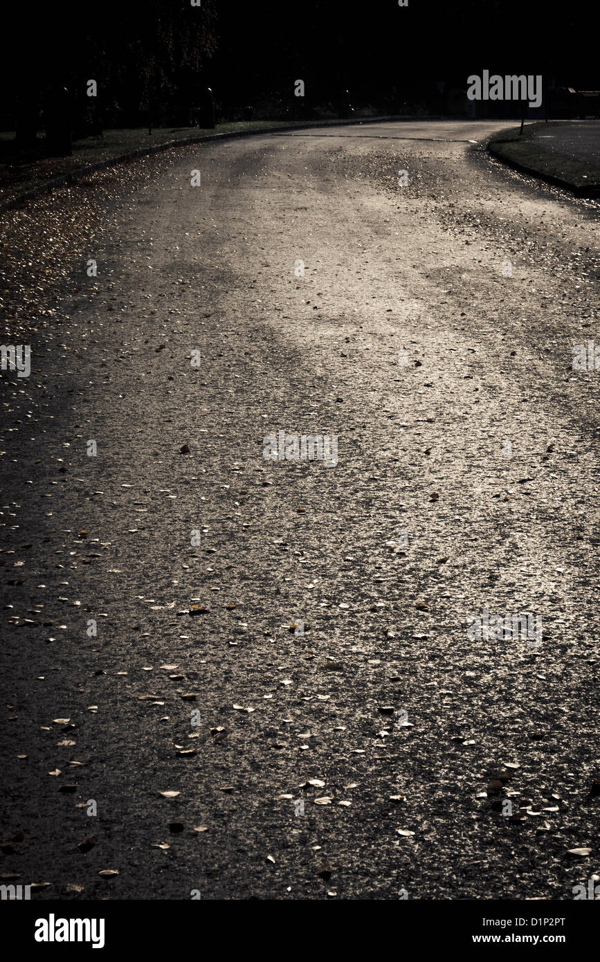 dark empty road with a turning Stock Photo - Alamy