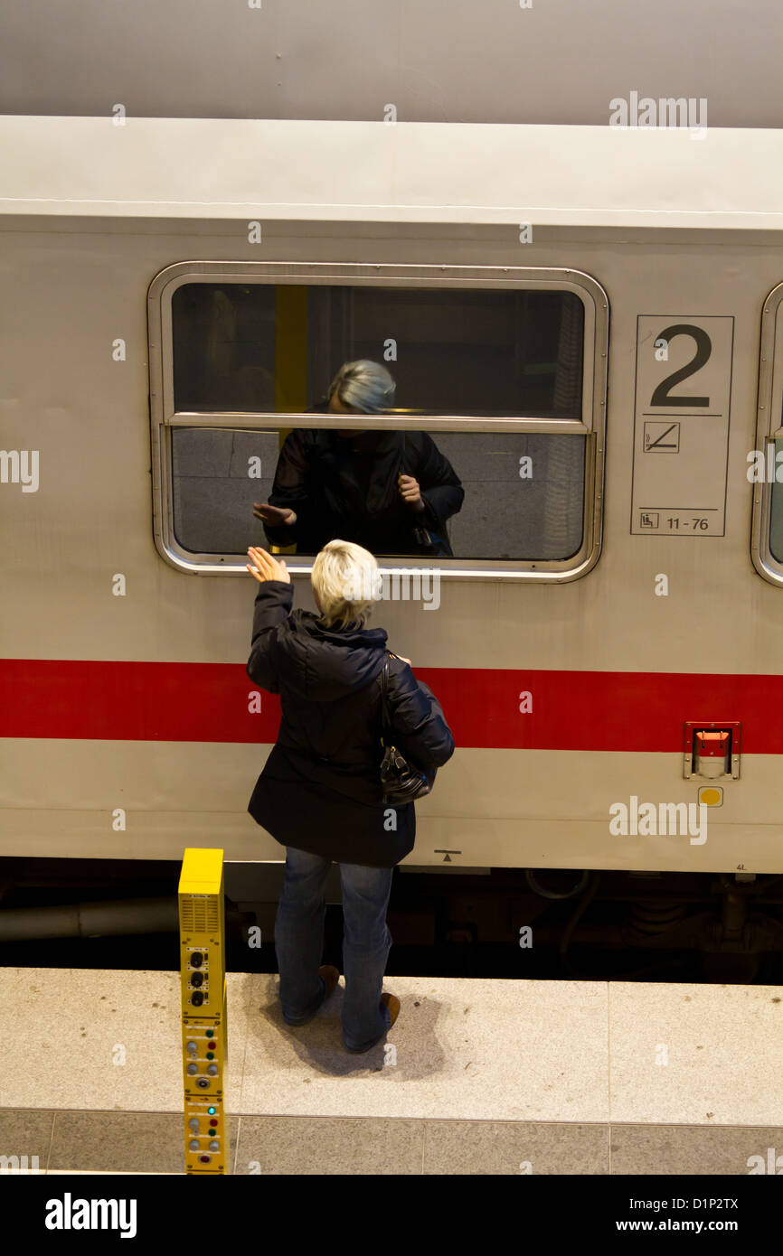 Woman at a departing Train in the Main Railway Station in Berlin ...