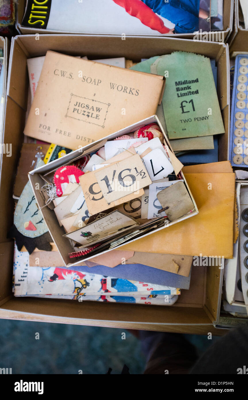 Boxes of old pre-decimal shop price tags at an auction of antiques ...