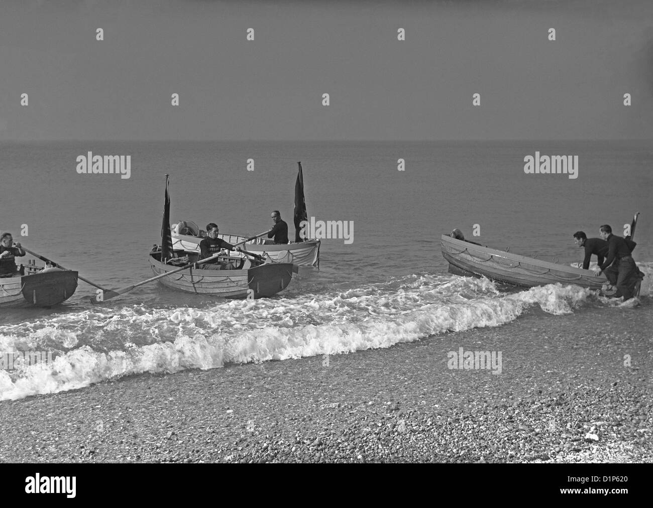 Brighton beach lifeguards launching their rowing rescue boats, c. 1950 ...