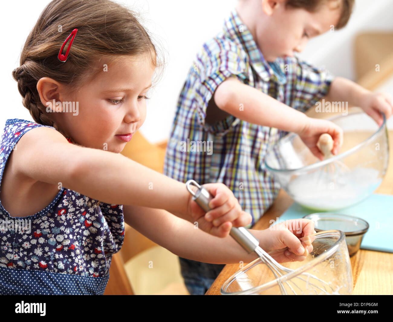 Young children baking Stock Photo - Alamy