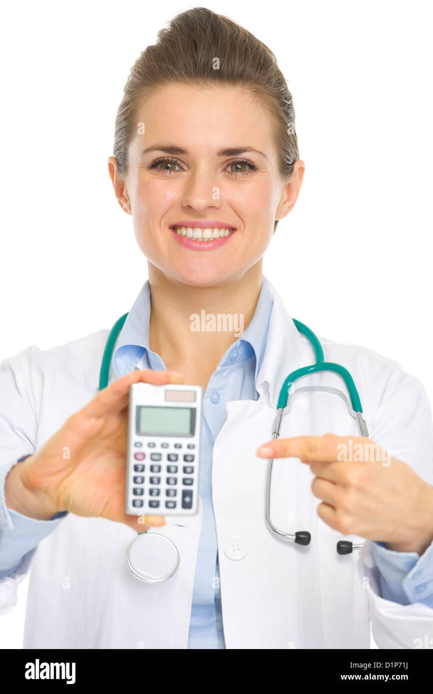 Closeup on medical doctor pointing on calculator Stock Photo - Alamy