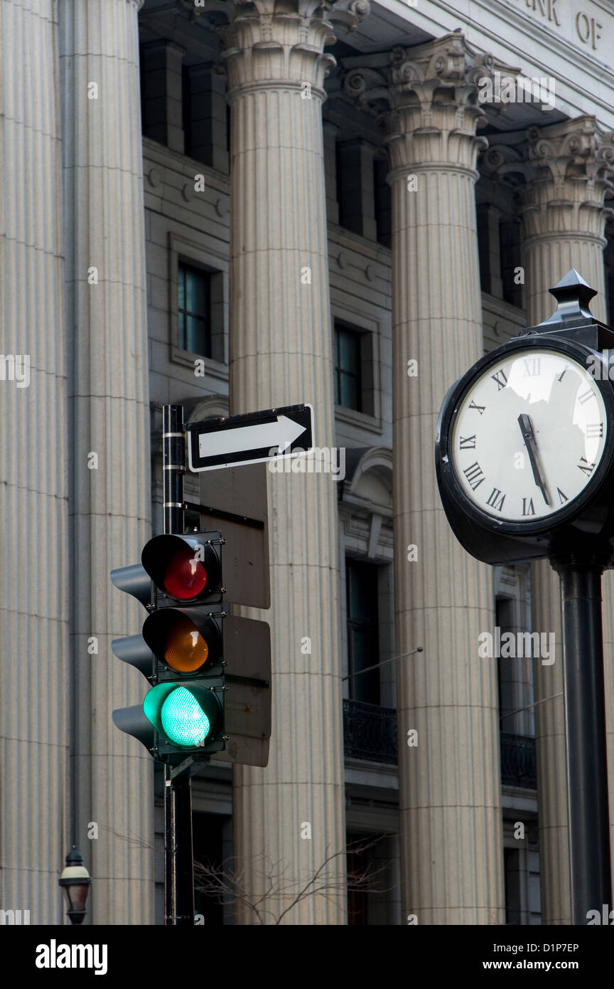 Clock post near traffic lights in a city, Ville-Marie, Montreal, Quebec ...
