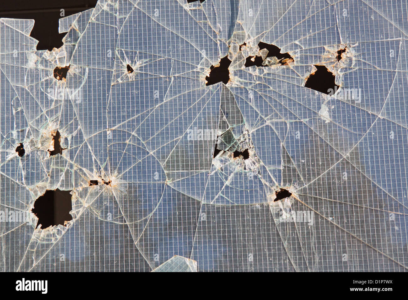 Smashed window in an abandoned industrial building Stock Photo - Alamy