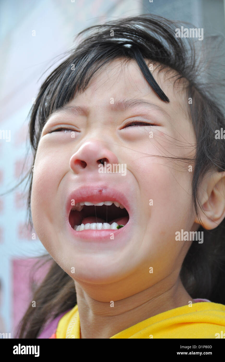 Asian baby crying Stock Photo - Alamy