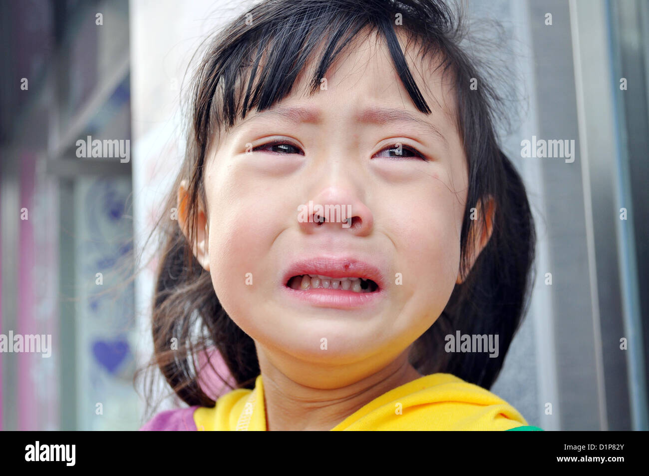 Asian baby crying Stock Photo - Alamy