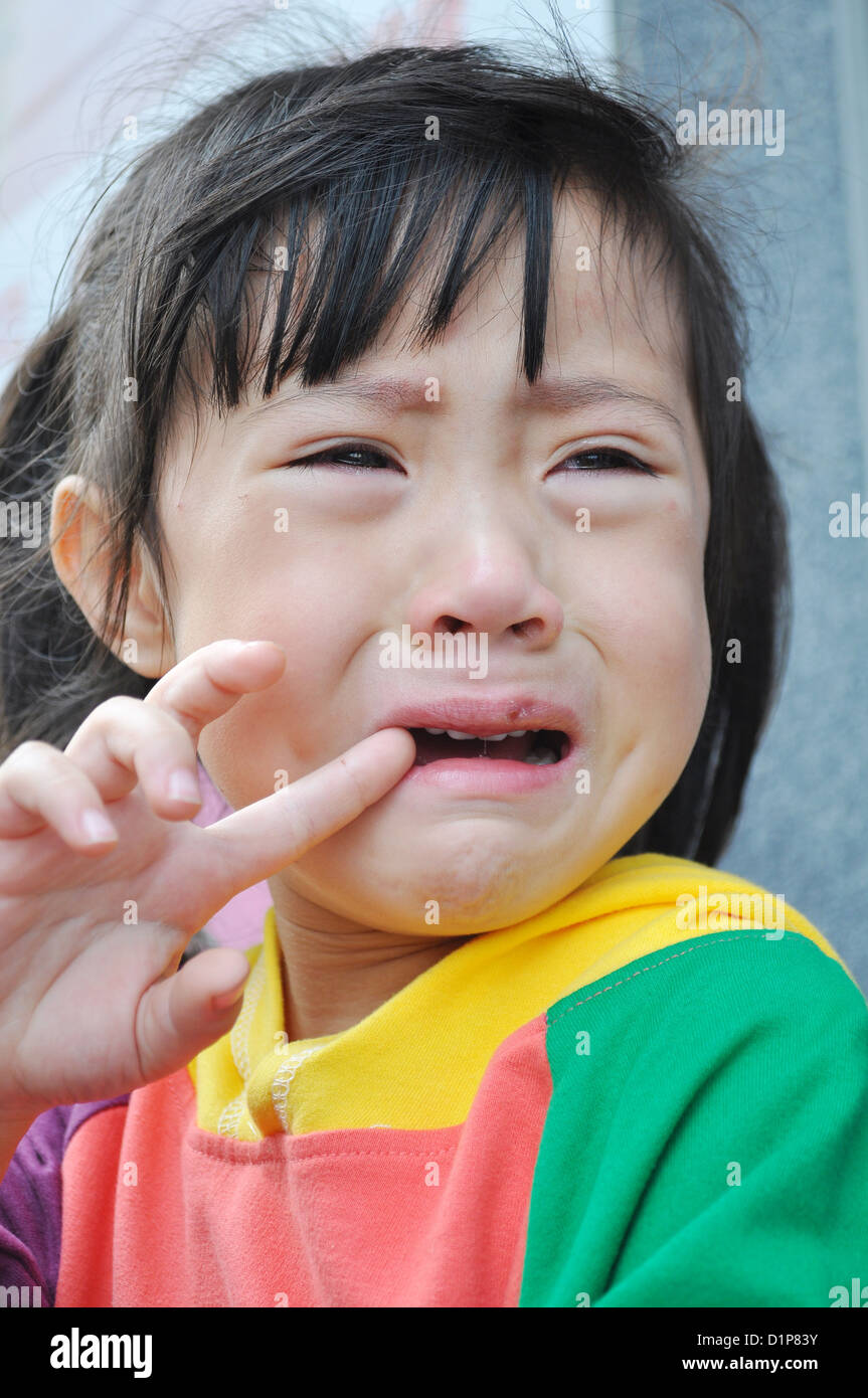 Asian baby crying Stock Photo - Alamy